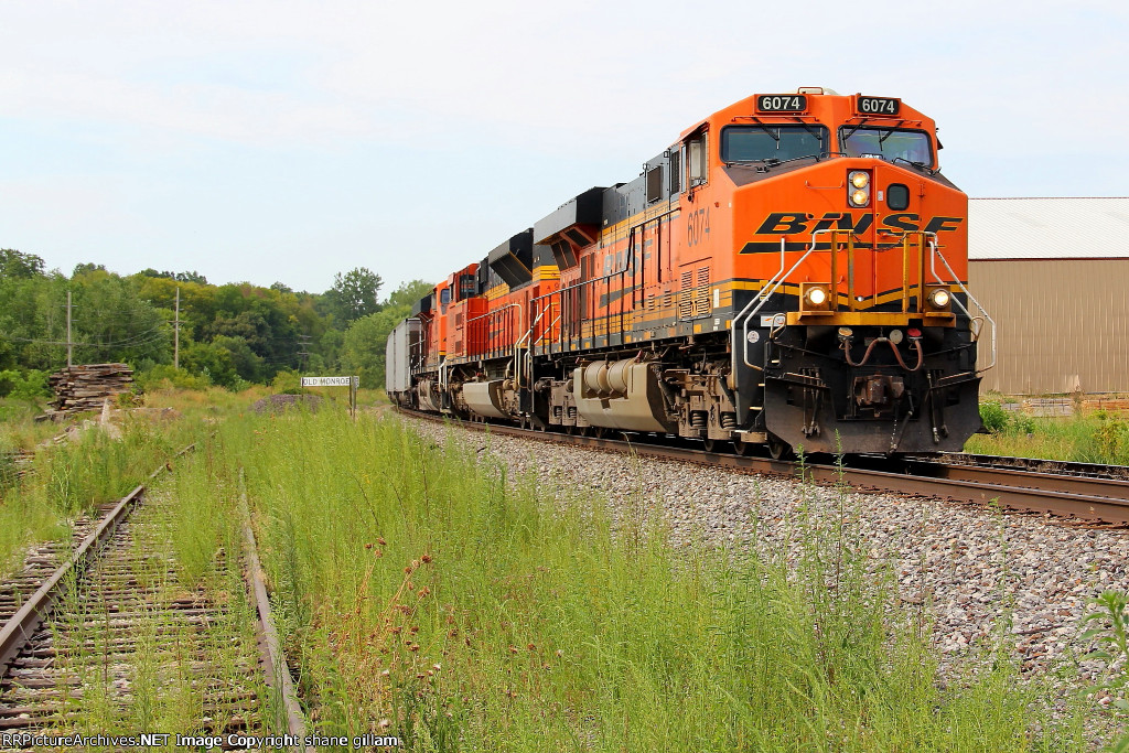 BNSF 6074 leads a sb rwsx coal load.